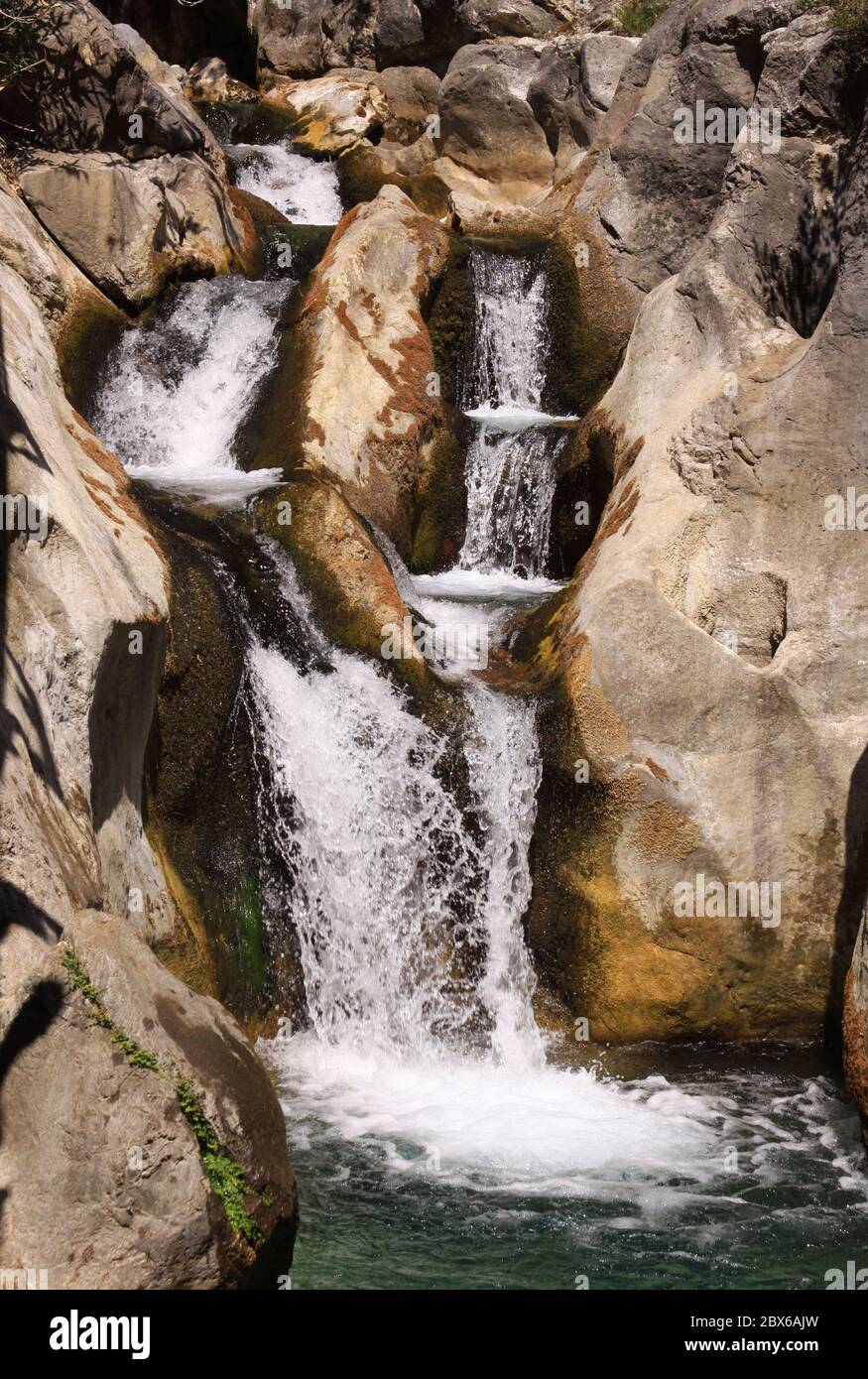 Waterfall terraces and steps of a river system flowing on rocky terrain ...