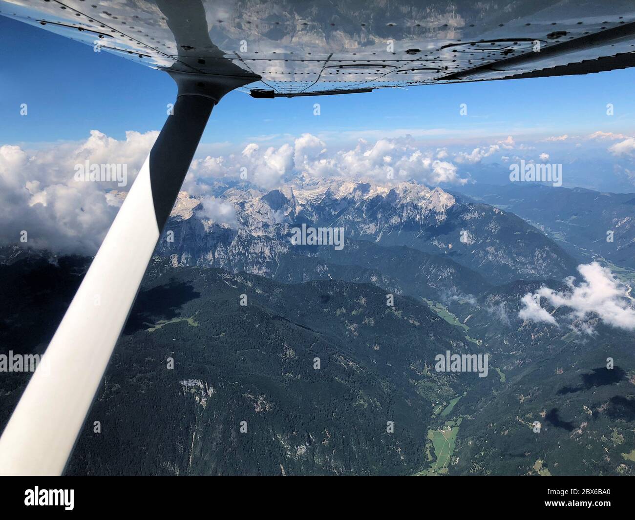 Austrian alps overflight in a small propeller plane Stock Photo - Alamy