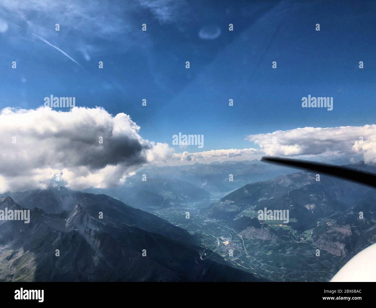 Austrian alps overflight in a small propeller plane Stock Photo - Alamy