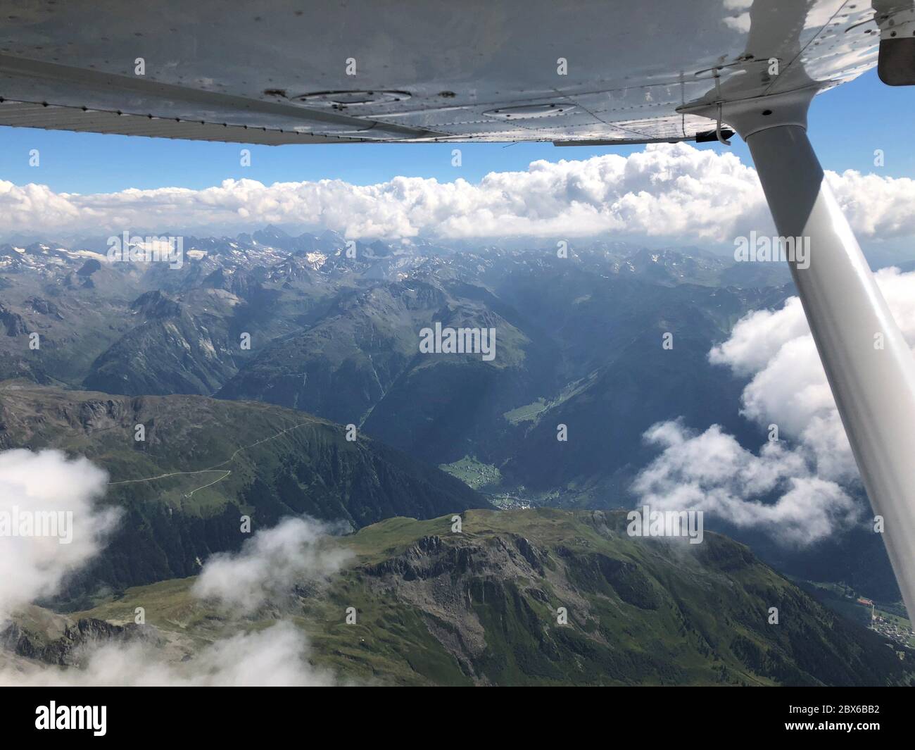 Austrian alps overflight in a small propeller plane Stock Photo - Alamy