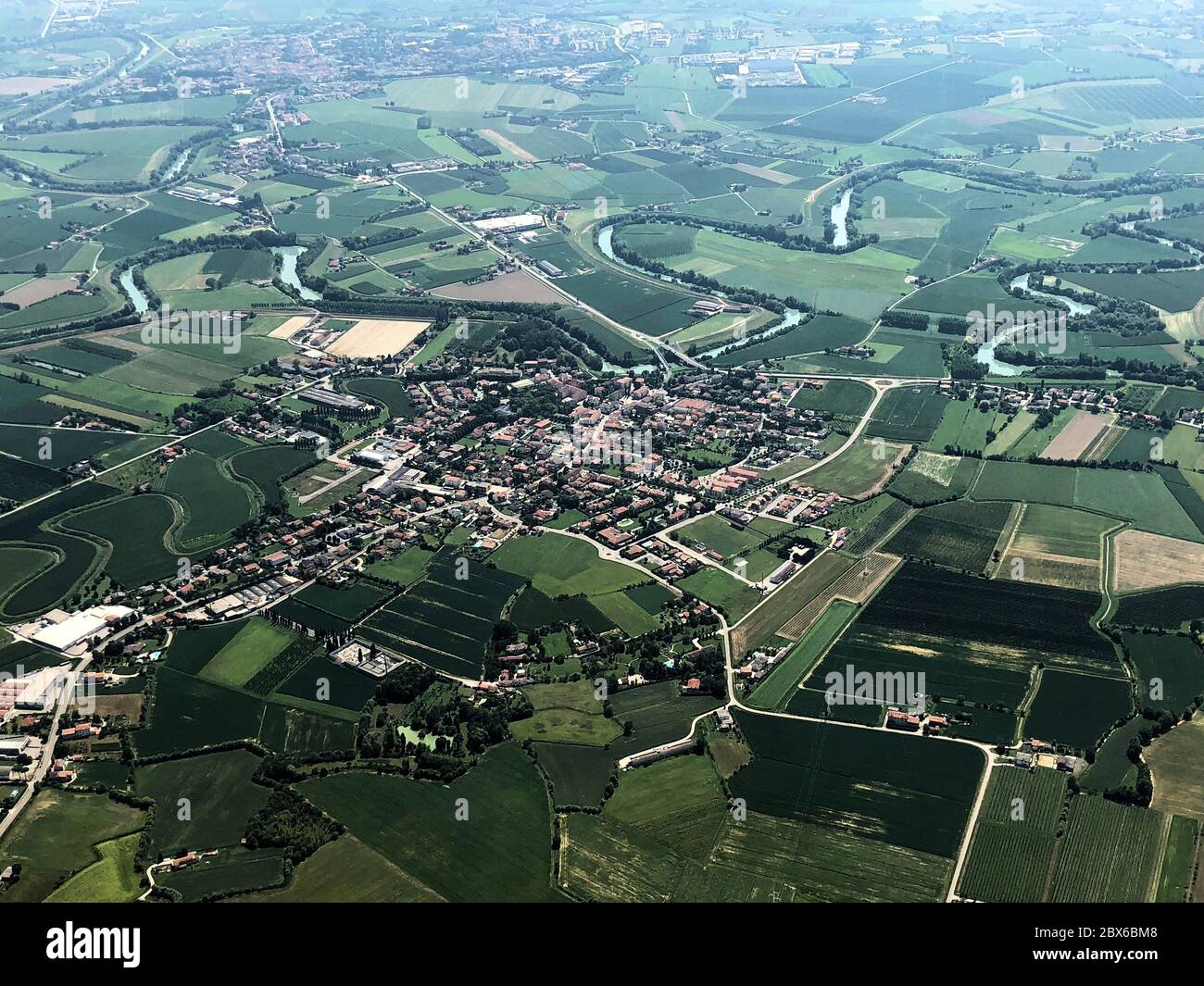 Italy overhead with a small airplane Stock Photo - Alamy