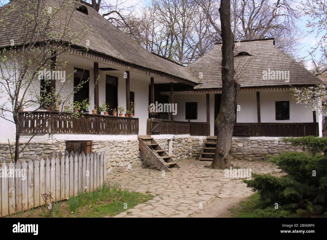 Traditional Romanian houses inside village museum Stock Photo - Alamy
