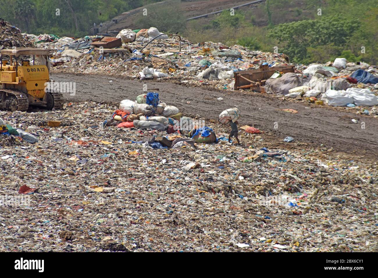 Thane, India. 05th June, 2020. Workers at Adharwadi Dumping ground ...