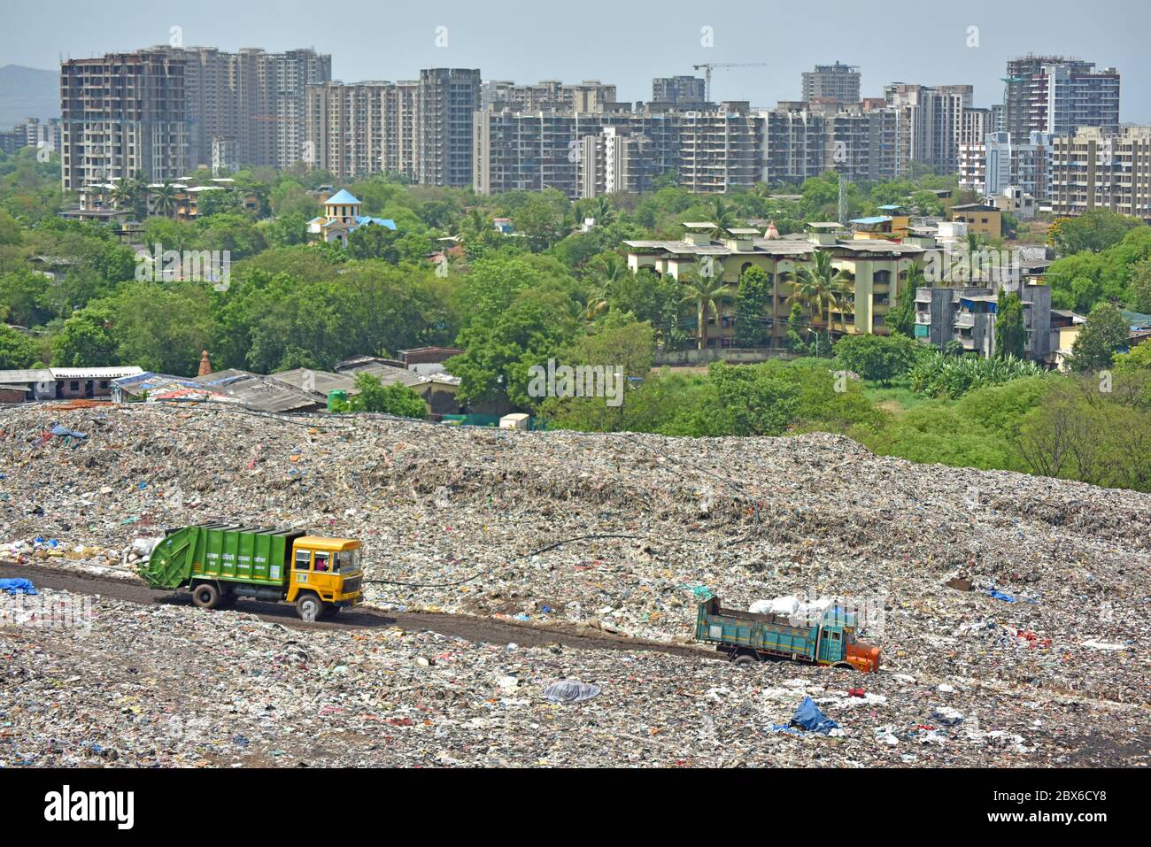 Thane, India. 05th June, 2020. Trucks carry trash to Adharwadi Dumping ...