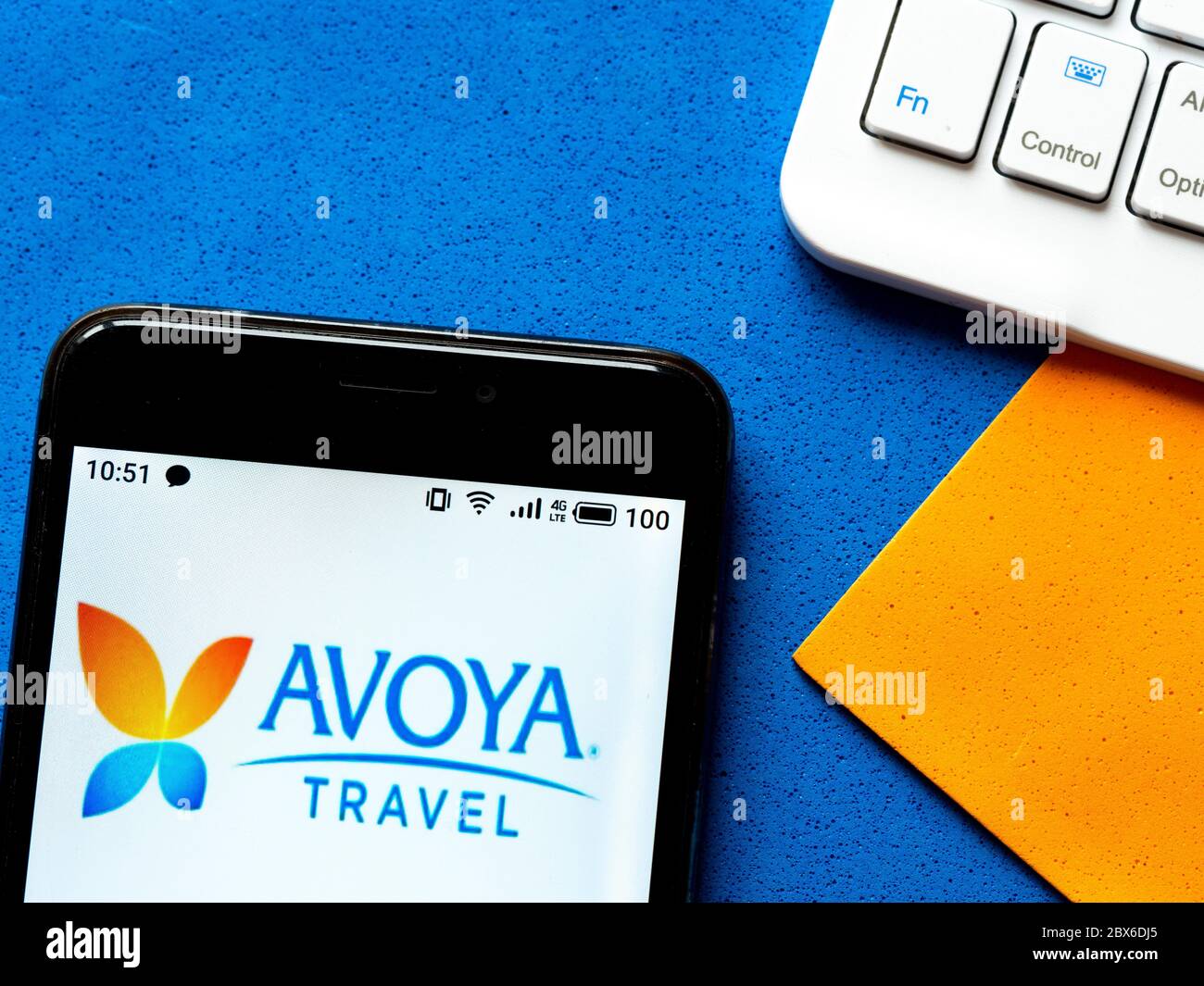 In this photo illustration e-commerce Avoya Travel logo is seen ...