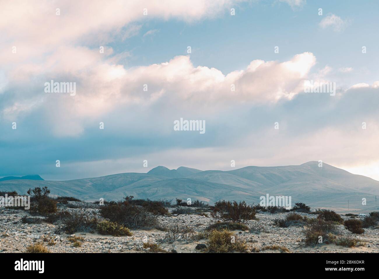 Clouds over volcanic desert landscape Stock Photo - Alamy