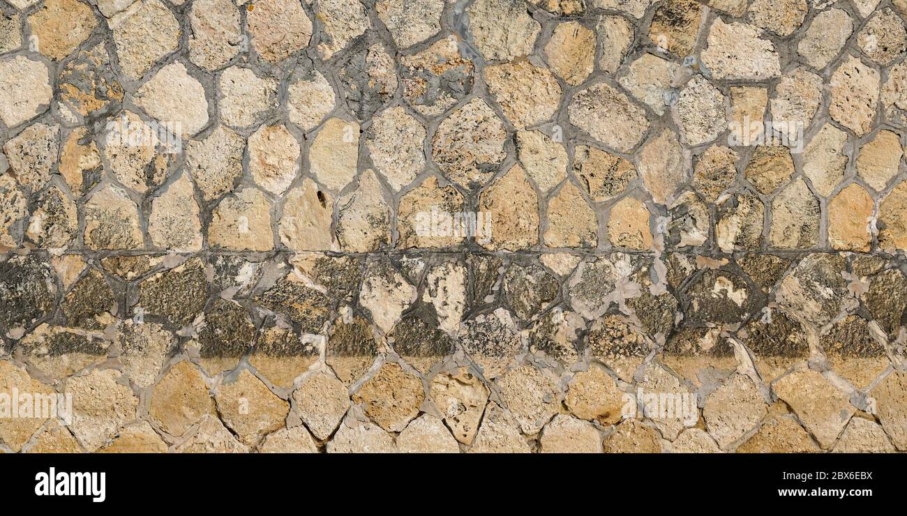 Stone wall background in lot of stones wallpaper ancient old surface ...