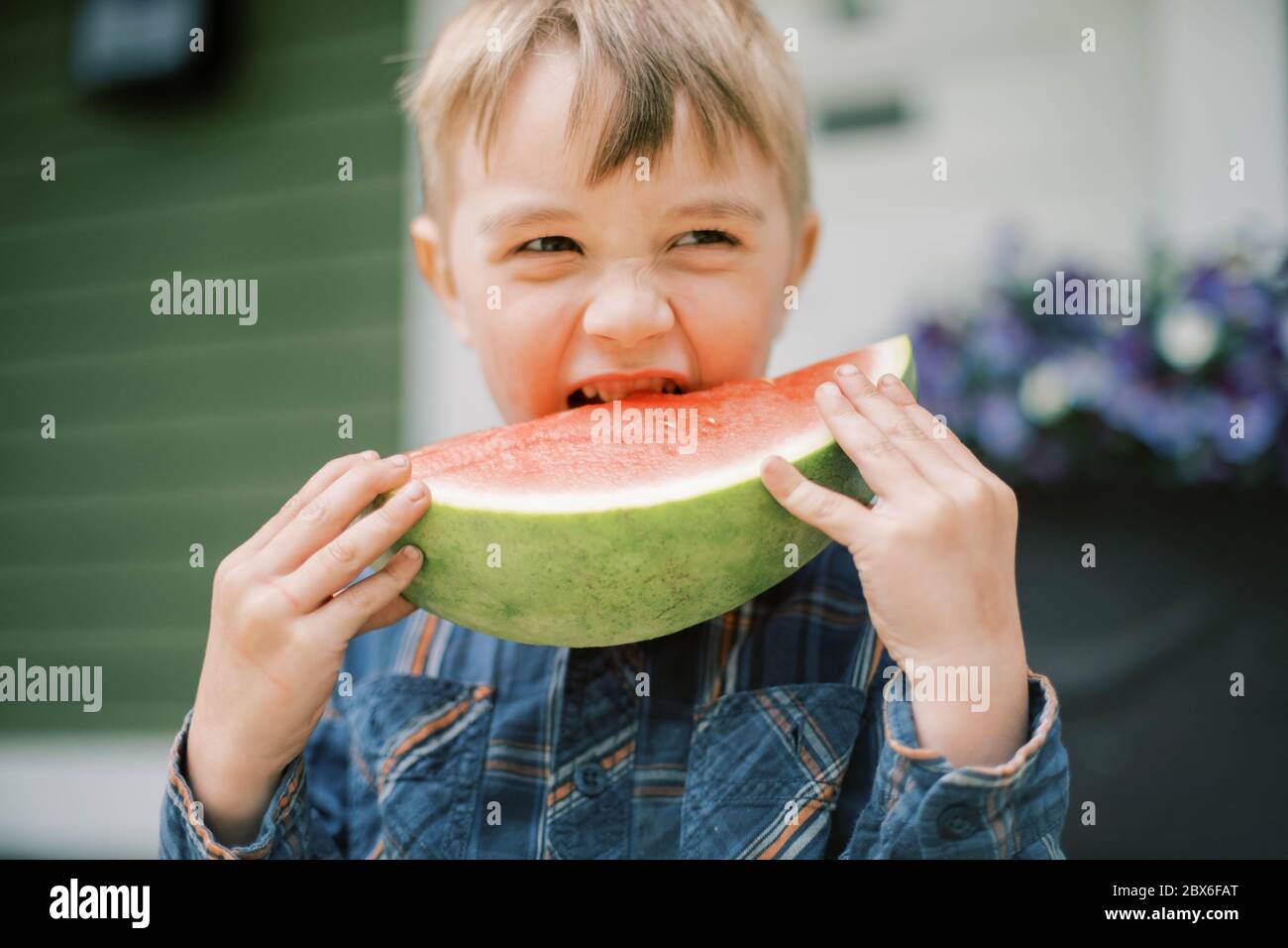 Taking a big bite hi-res stock photography and images - Alamy