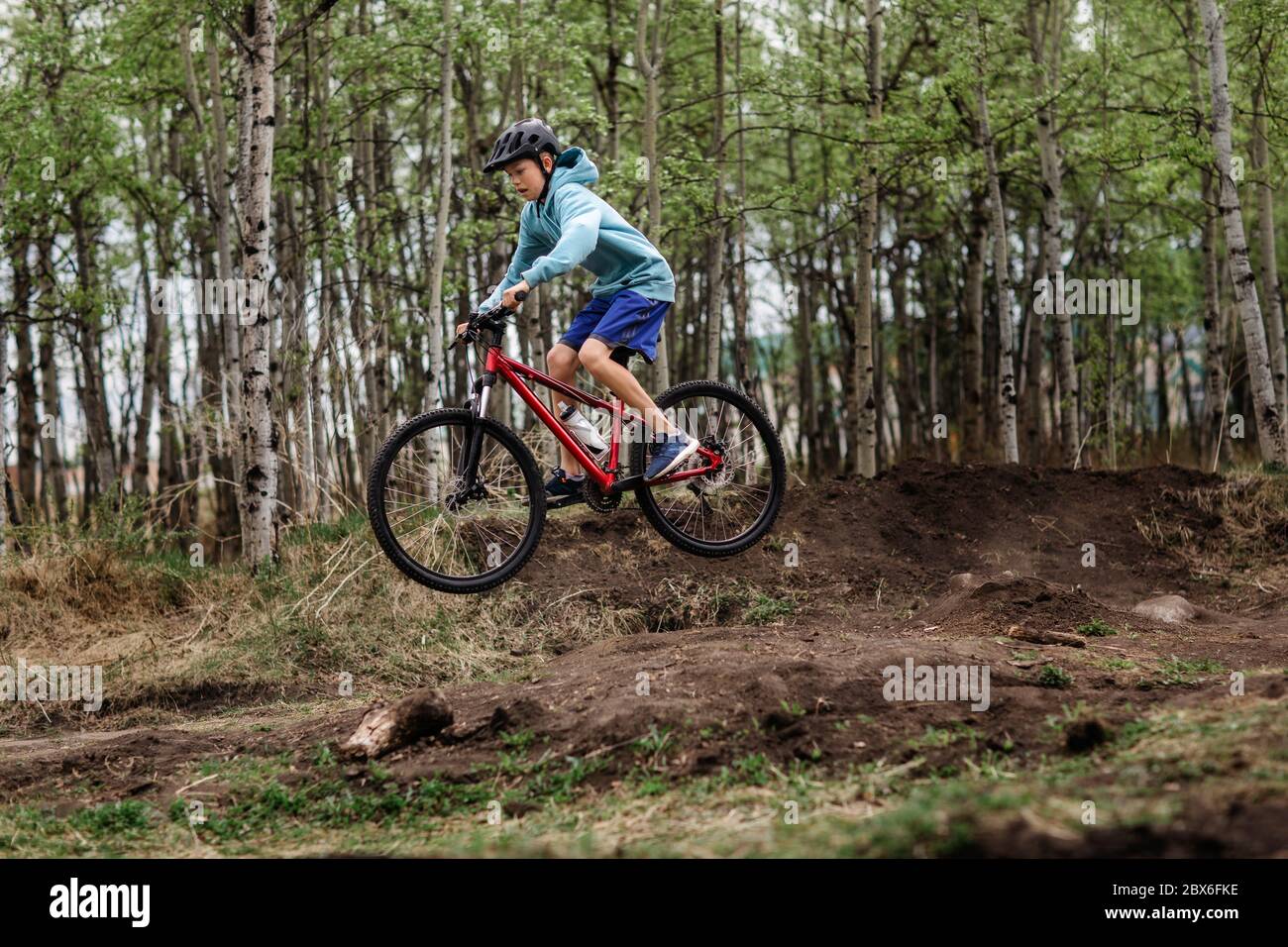 Teen boy on mountain bike hi-res stock photography and images - Alamy