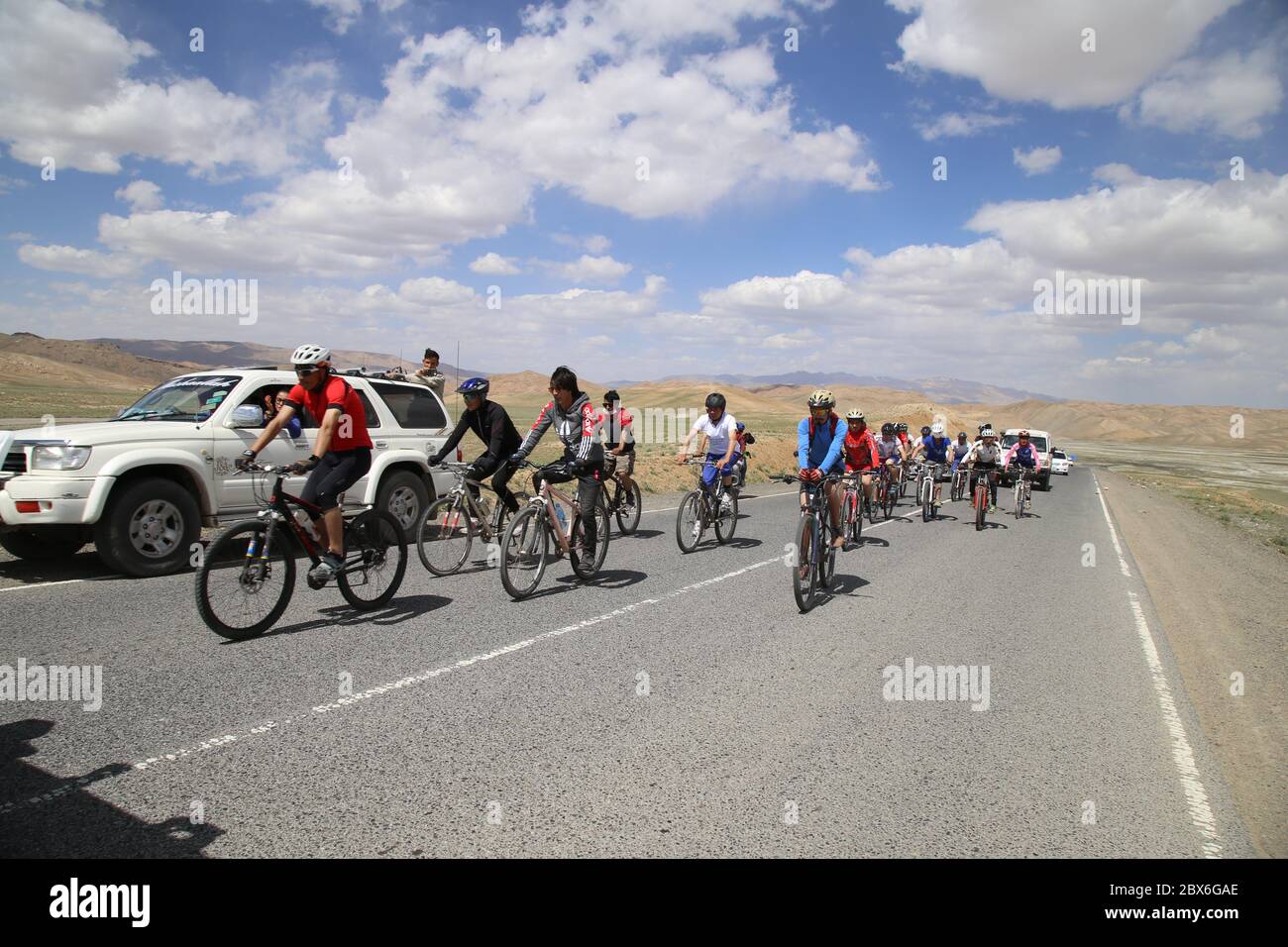Bamiyan, Afghanistan. 5th June, 2020. People ride bicycles during a ...