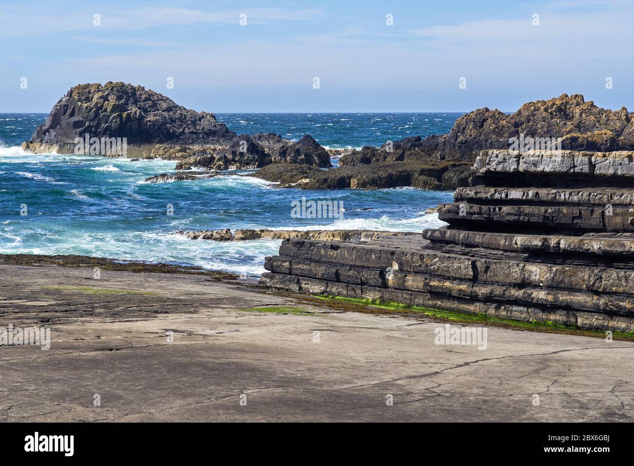 The Stack volcanic plug with limestone rocks at Scarlett Point ...