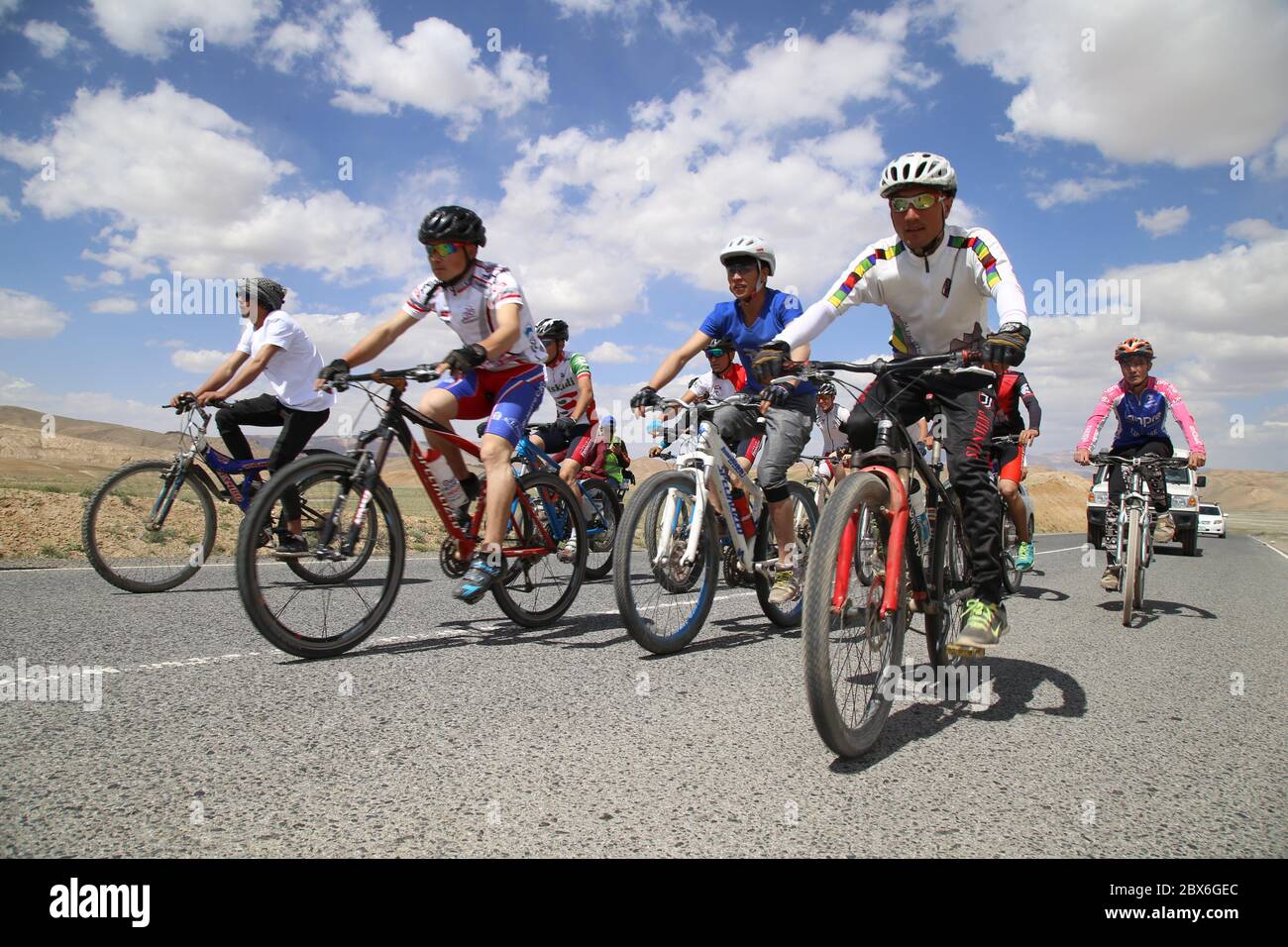 Bamiyan, Afghanistan. 5th June, 2020. People ride bicycles during a ...