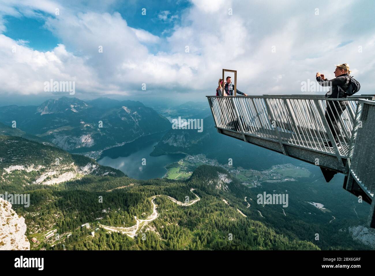 Tourists posing in front of stunning view at the 5 Fingers observation ...