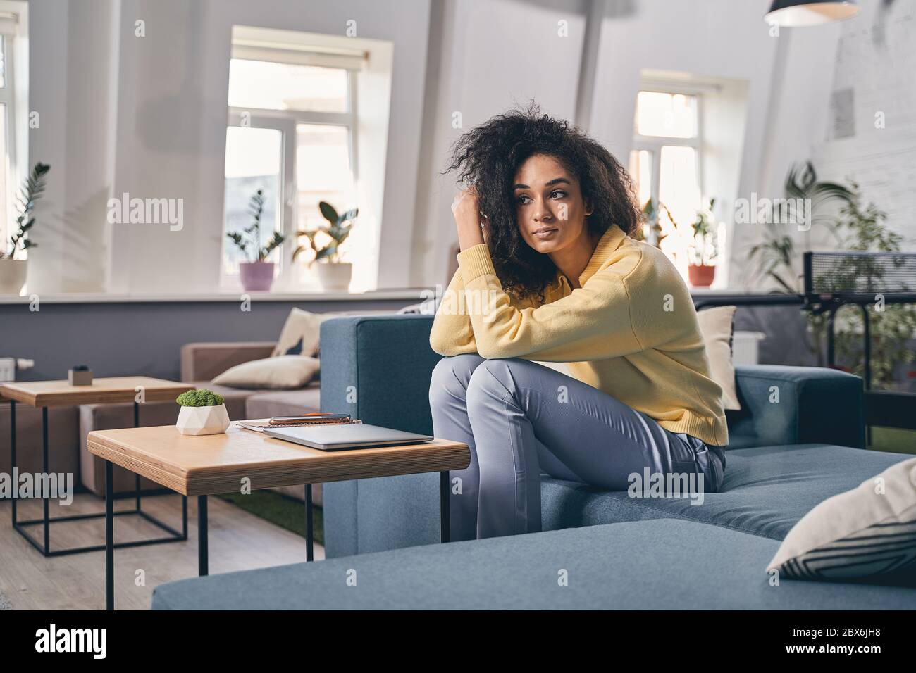 Woman staring distance office hi-res stock photography and images - Alamy
