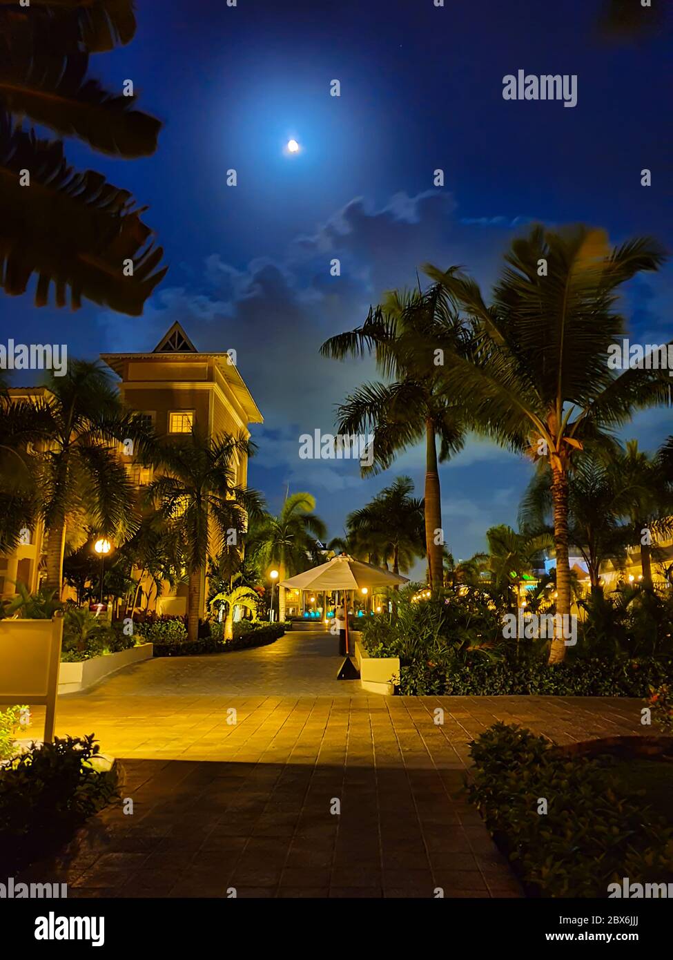 Grand Bahia Principe Resort at night with full moon on the sky in Punta ...