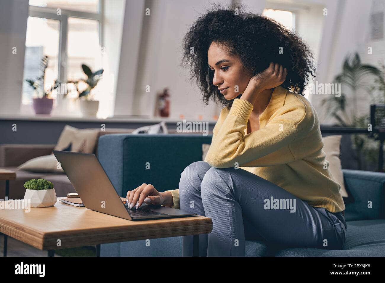 Side view concentrated female entrepreneur hi-res stock photography and ...