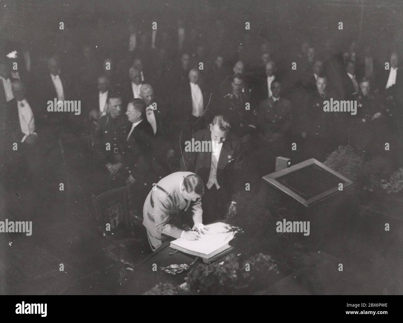 Hitler and Goebbels at the entry in the golden book of the city of ...