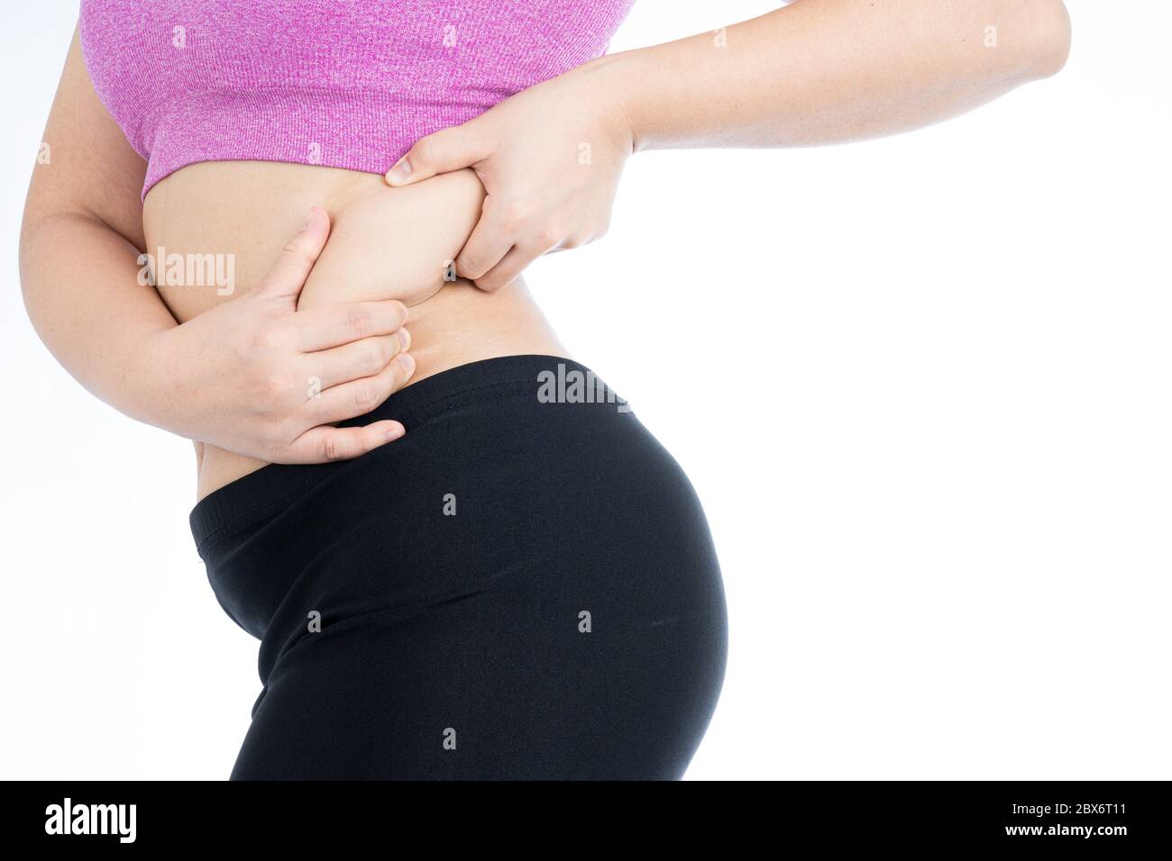 Fat woman holding excessive fat belly lower back, overweight fatty ...