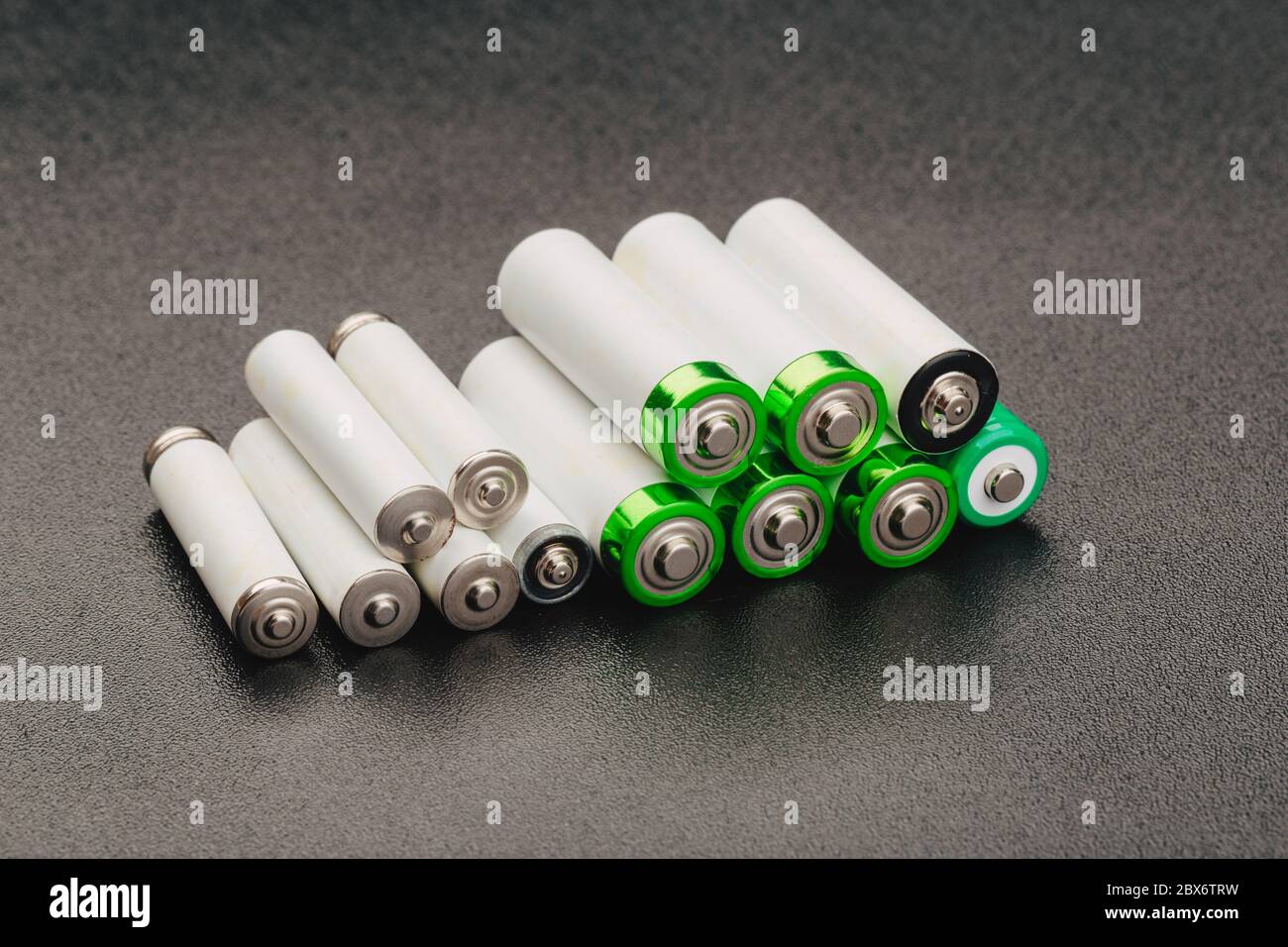 close up of battery positive poles on black backgrounds. intended ...