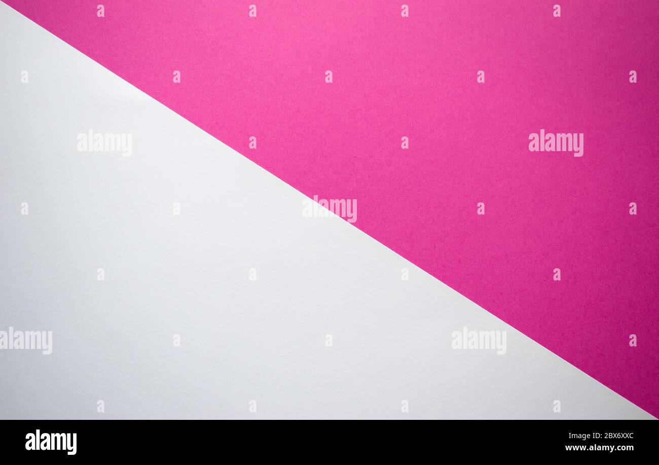 Pink and white diagonally divided background Stock Photo - Alamy
