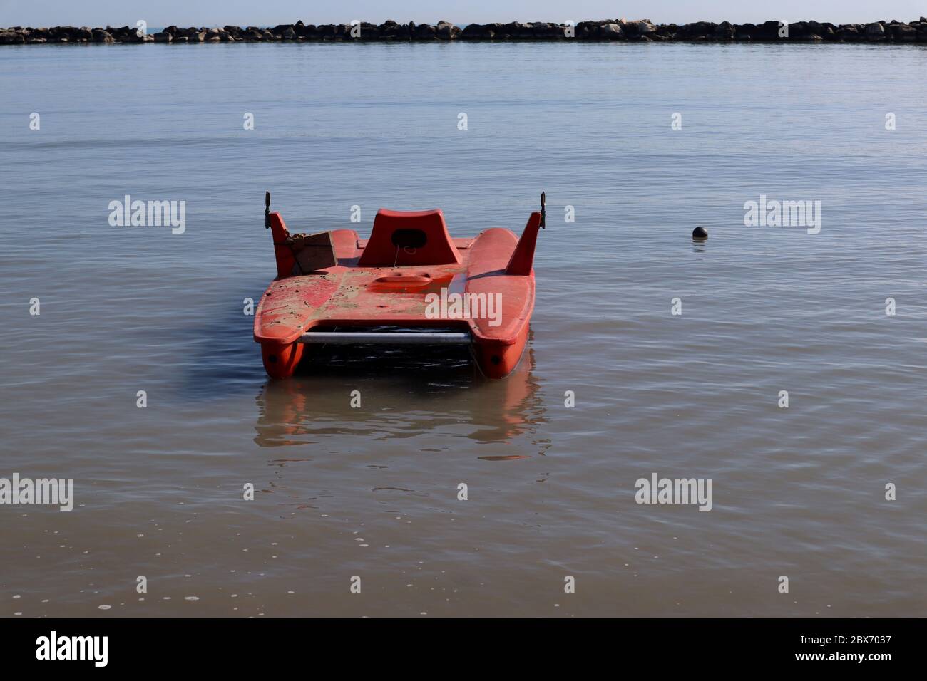 old red rescue boat on the Adriatic sea, Rimini beach Italy Stock Photo ...