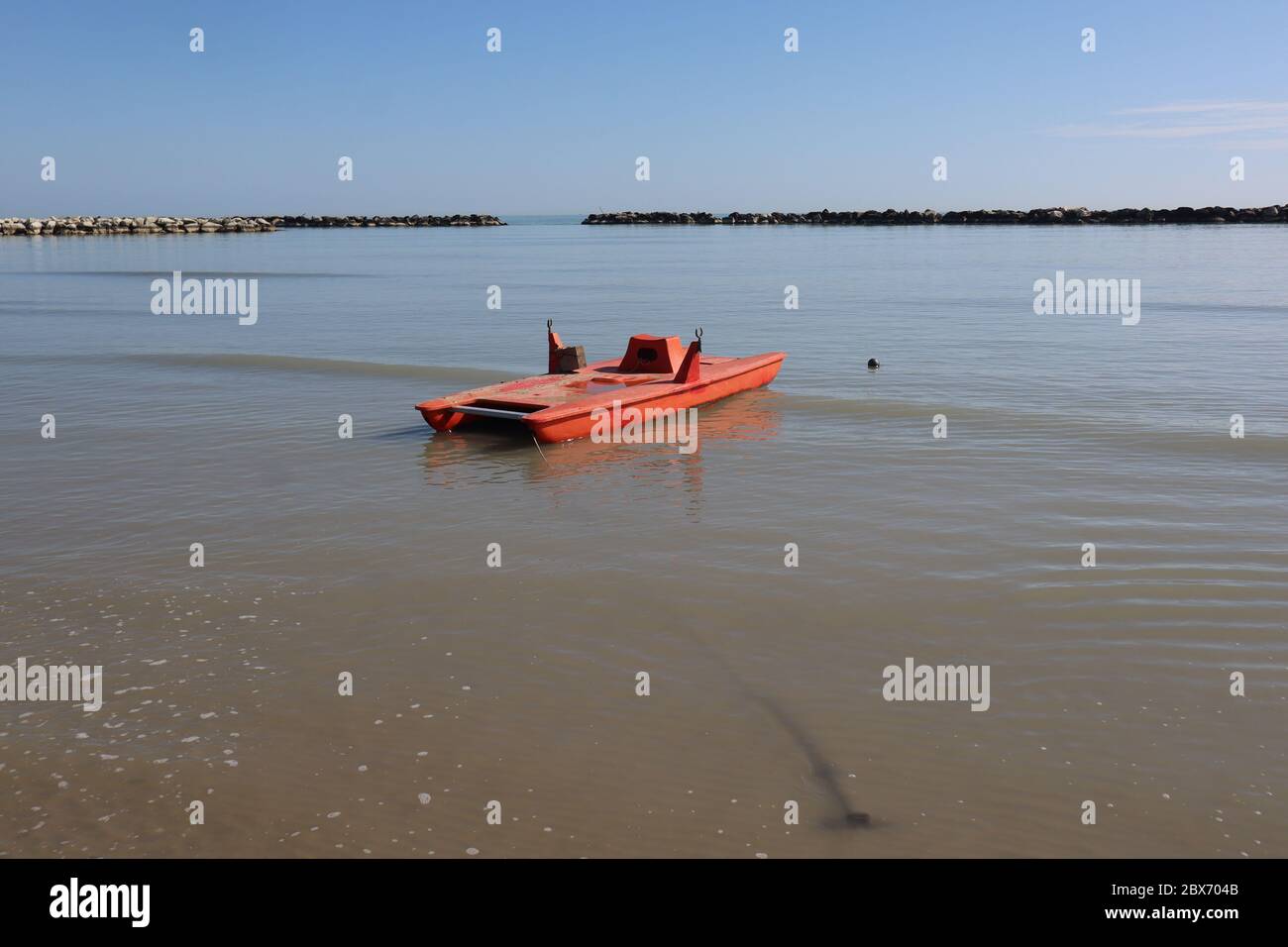 old red rescue boat on the Adriatic sea, Rimini beach Italy Stock Photo ...