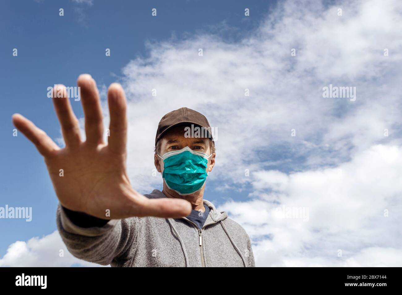 man wearing a face mask to protect against viral infection Stock Photo ...