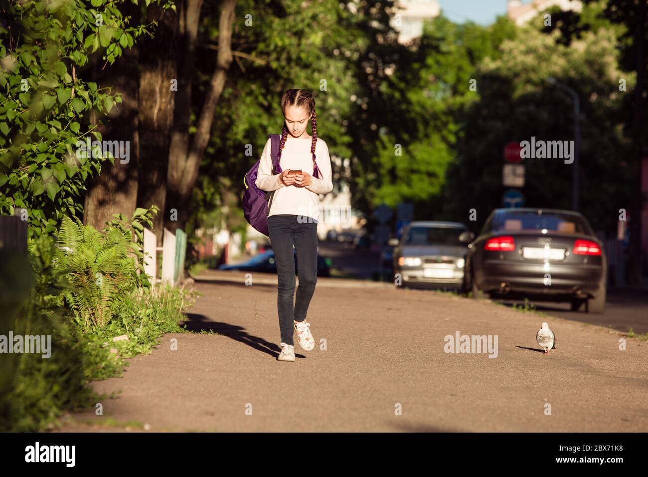 Child walking to school alone hi-res stock photography and images - Alamy