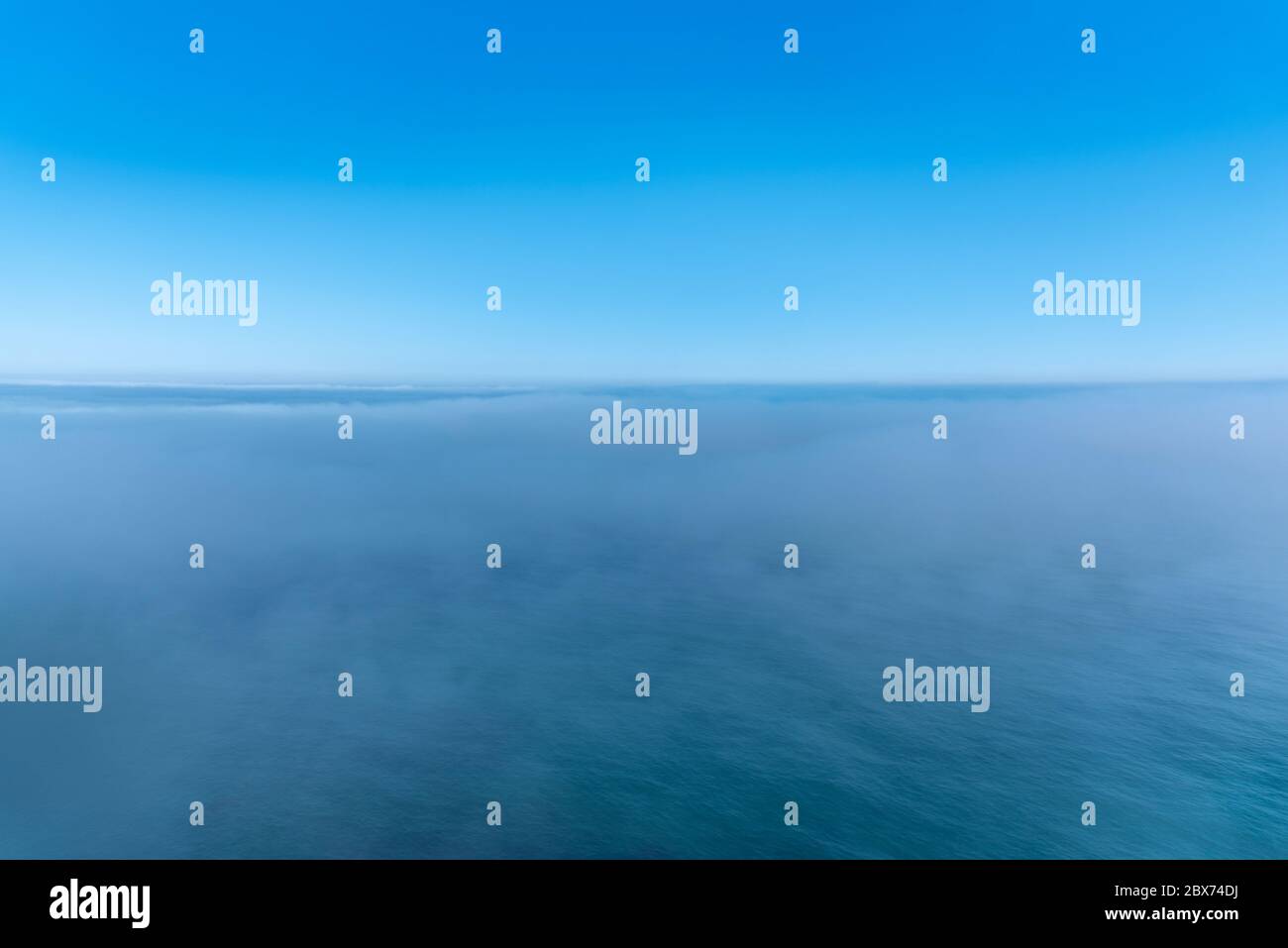 Sea waves in the fog Stock Photo - Alamy