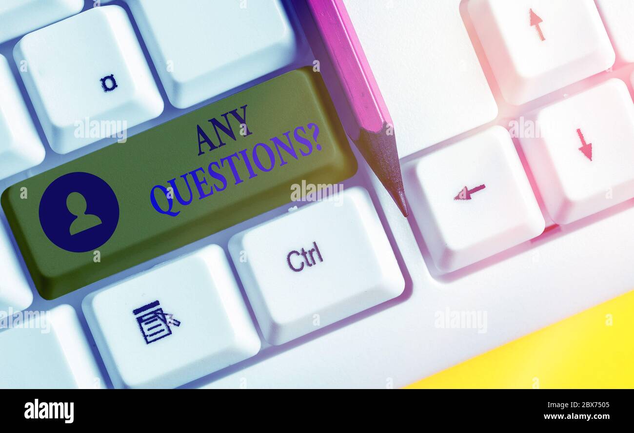 Writing note showing Any Questions Question. Business concept for ...