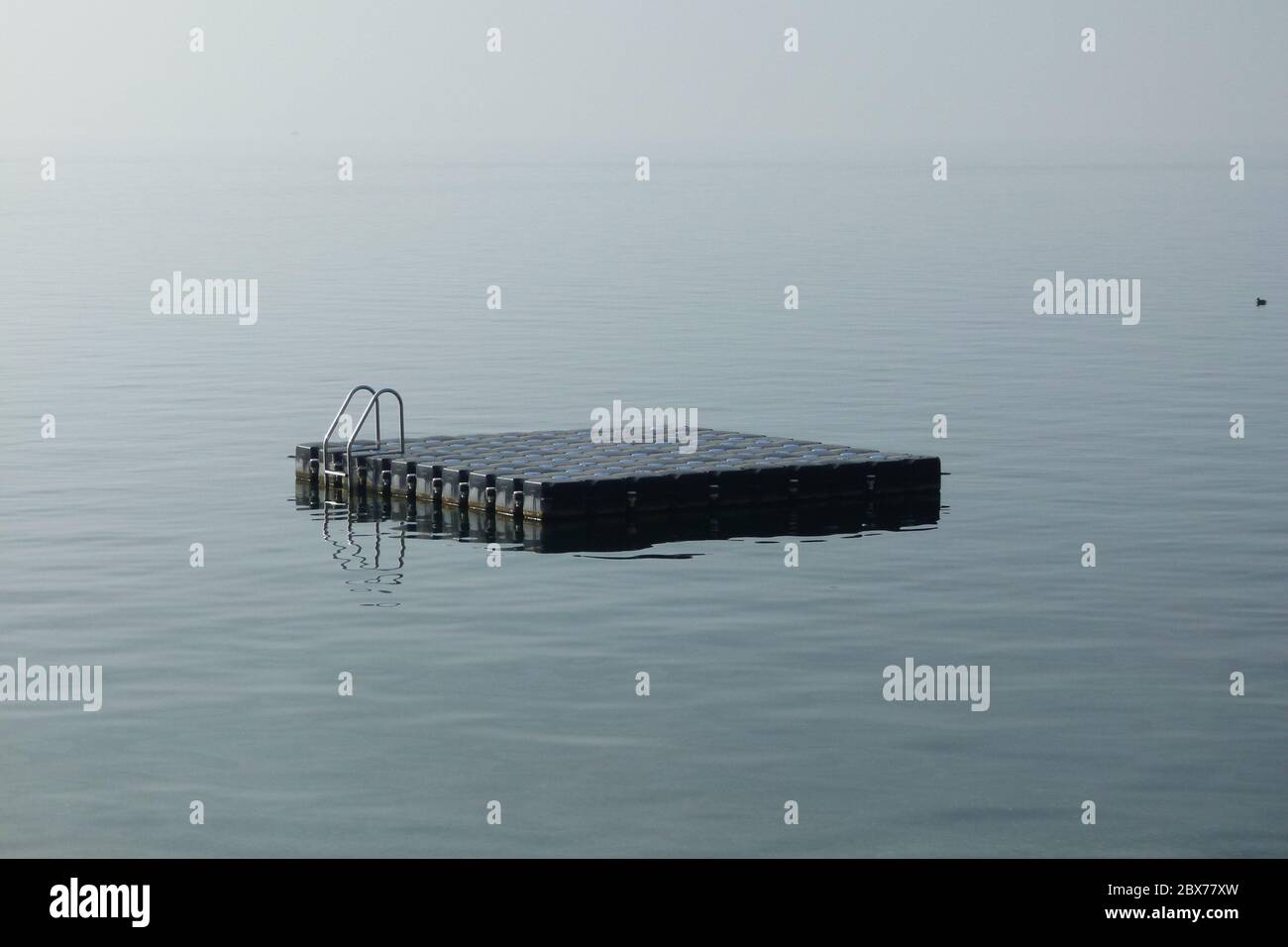 floating peer on the water Stock Photo - Alamy