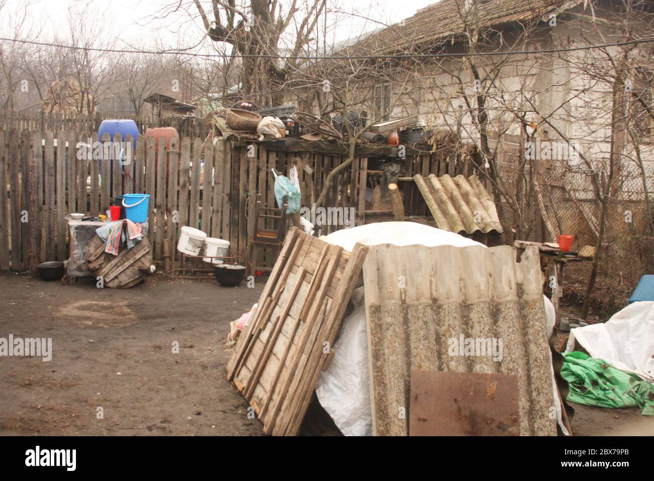 Messy yard in Romania's countryside. Living conditions, reportage Stock ...
