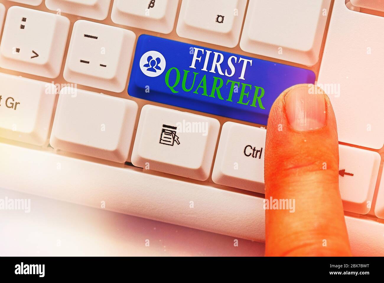 Writing note showing First Quarter. Business concept for one of the ...