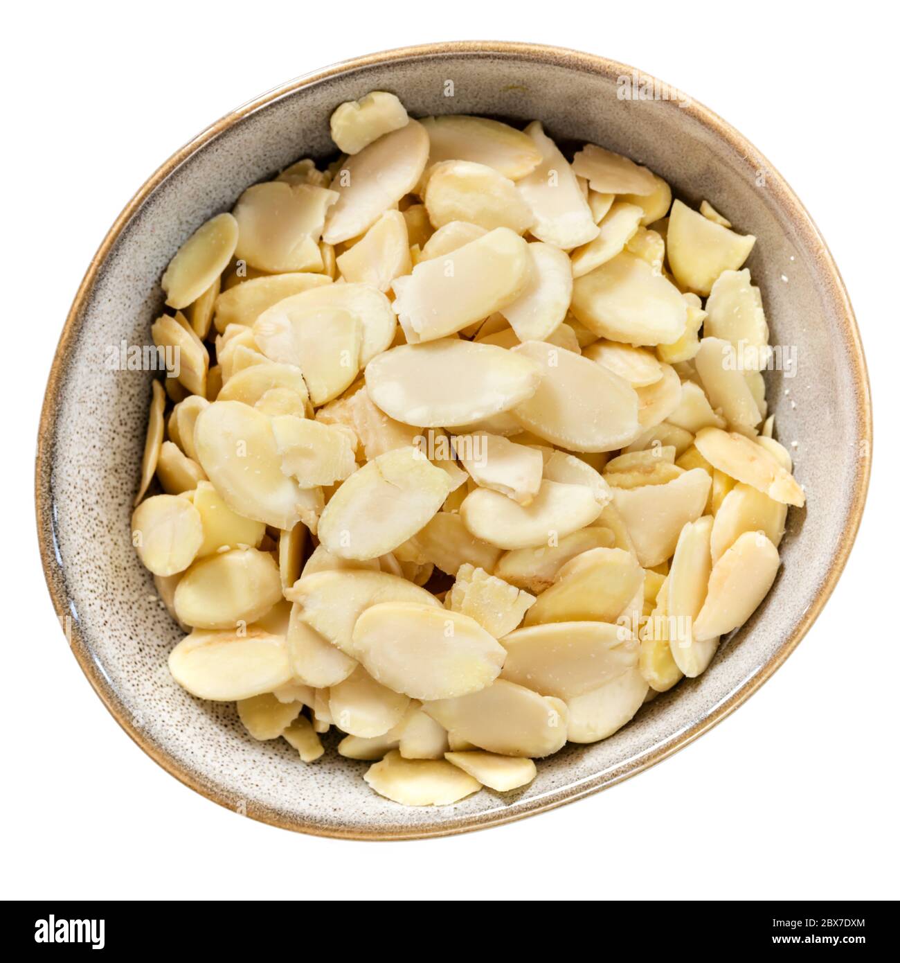 Flaked almonds in stoneware bowl. Top view, isolated on white Stock ...