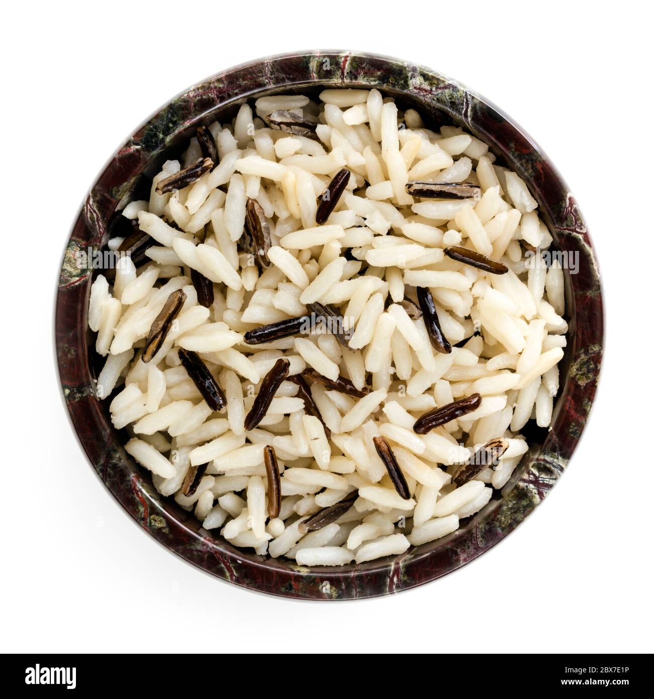 Wild rice in bowl, top view, isolated Stock Photo - Alamy