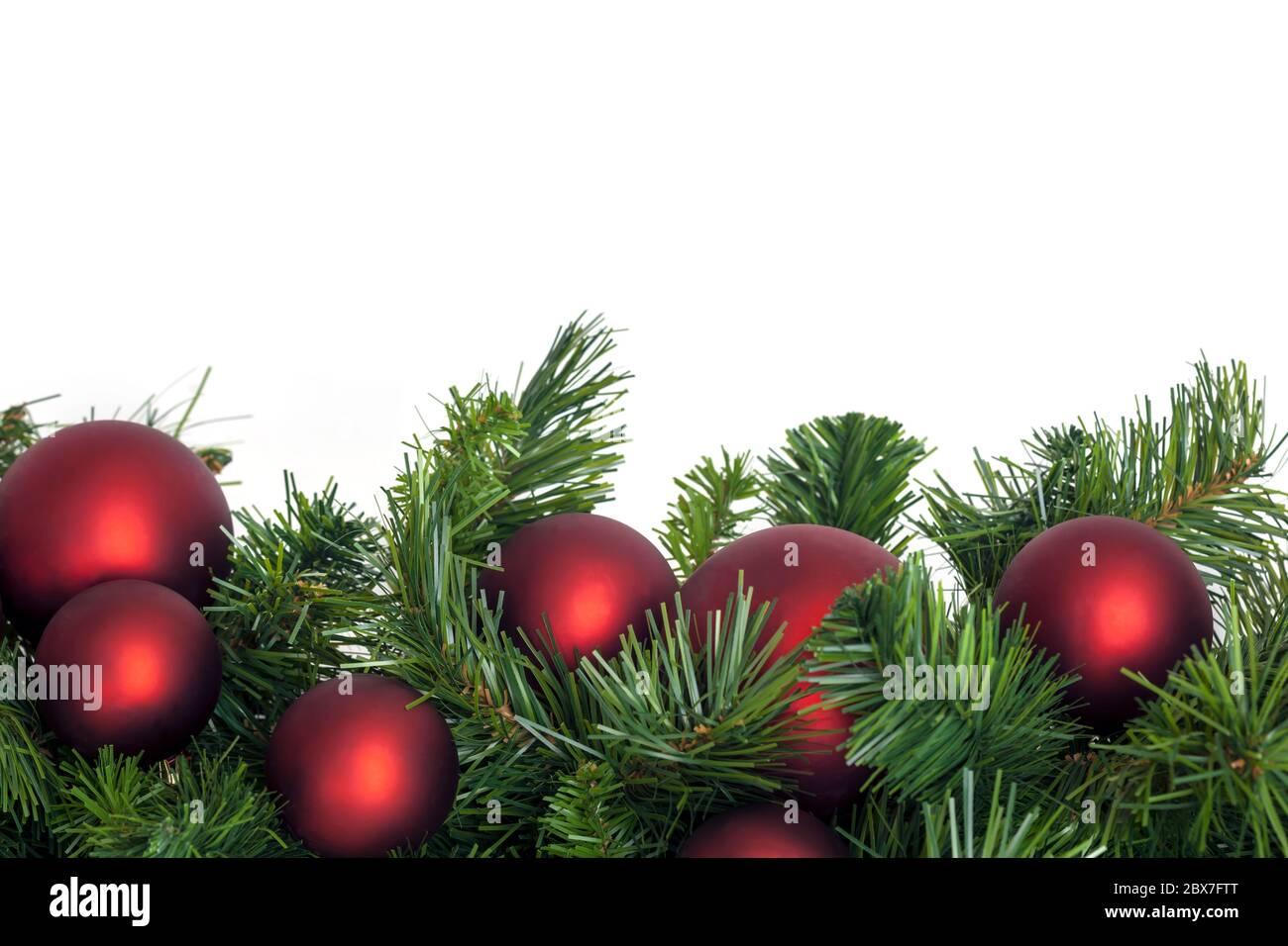 Christmas garland with red baubles. Border over white background Stock ...
