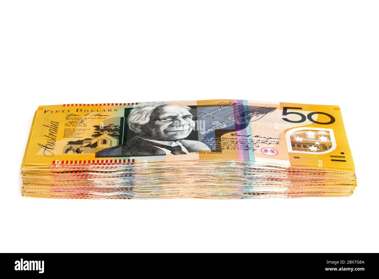 Stack of Australian money. Fifty dollar bills. Side view, isolated on white Stock Photo - Alamy