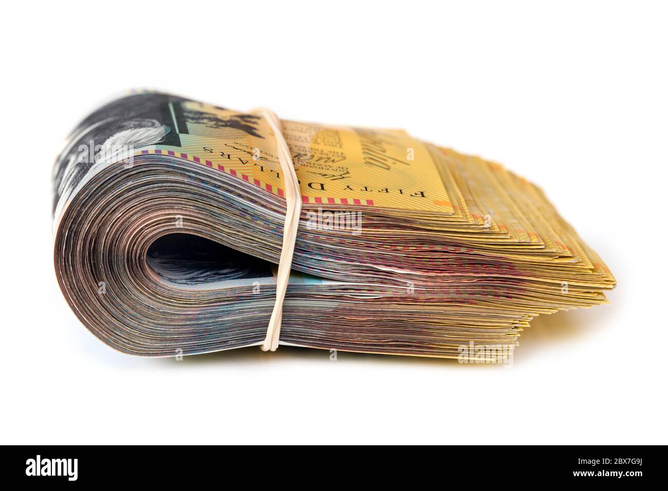 Bundle of Australian money isolated on white. Side view Stock Photo - Alamy