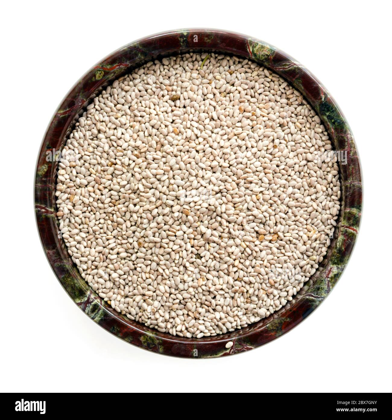 White chia seeds in stone bowl. Top view, isolated Stock Photo - Alamy