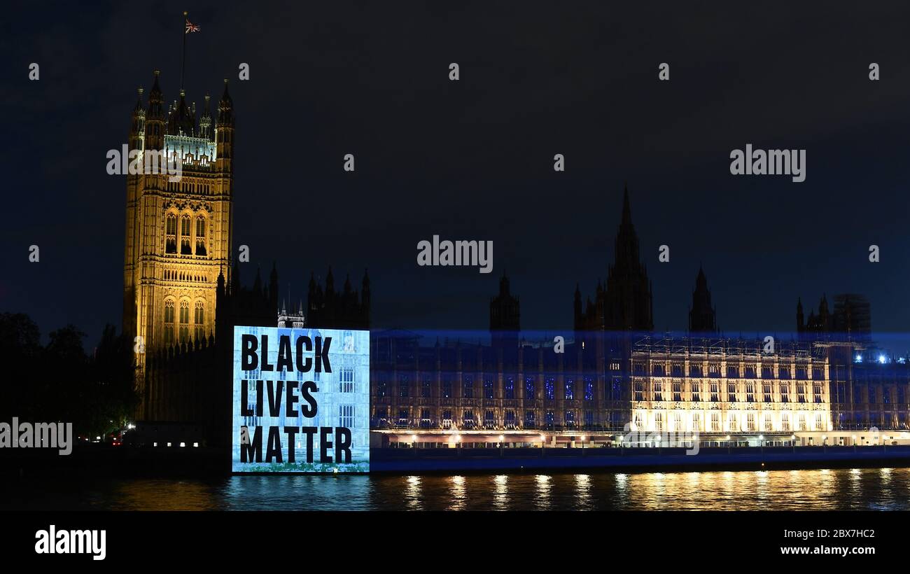 Black lives matter is projected onto the houses of parliament hi-res ...