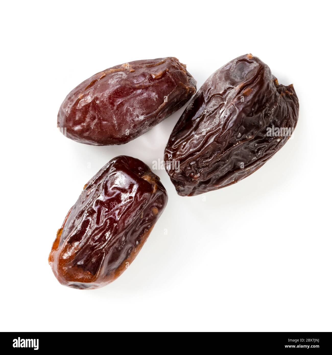 Dates isolated on white Stock Photo - Alamy