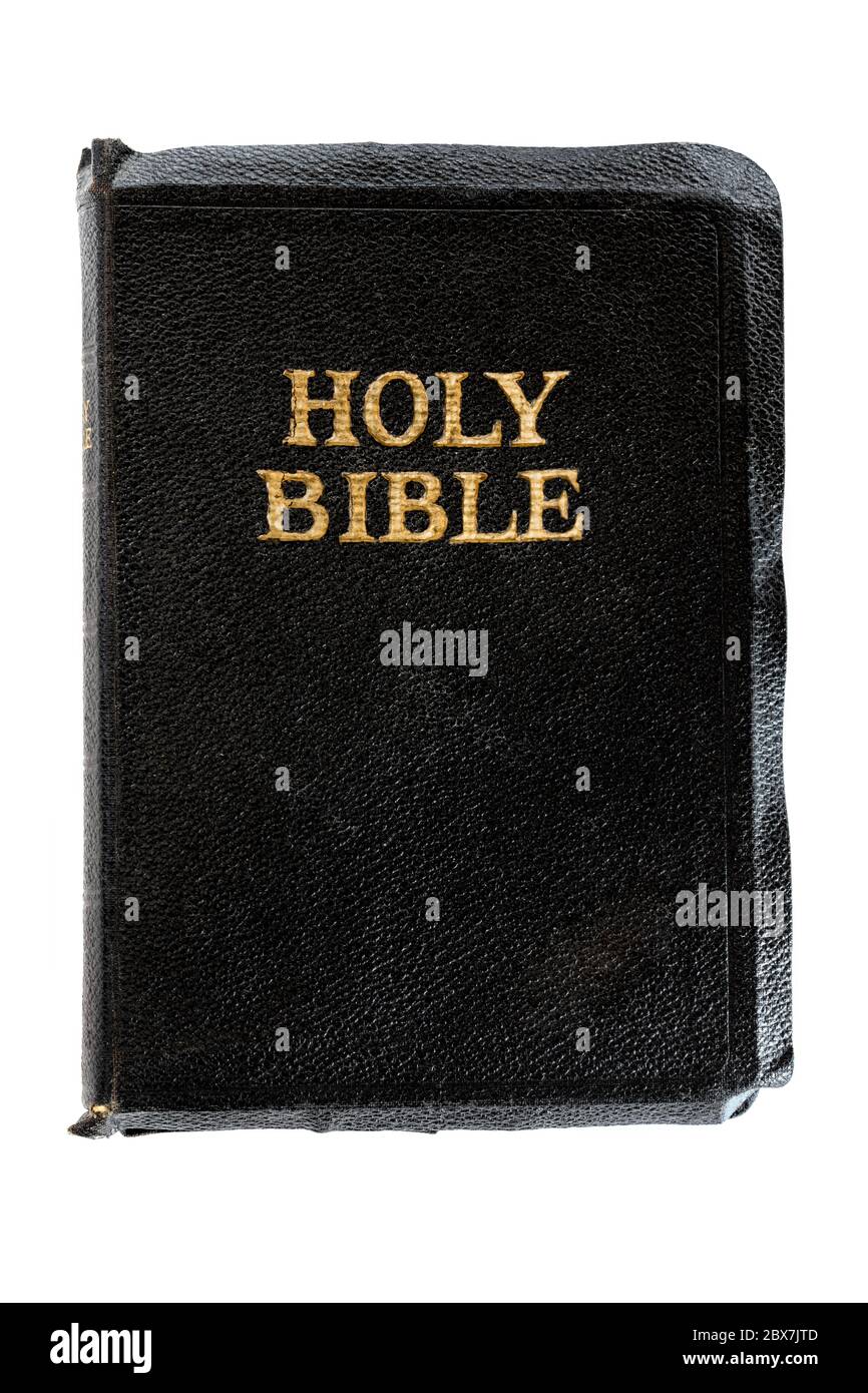 Old Bible isolated on white. Top view, closed, with gold embossed ...
