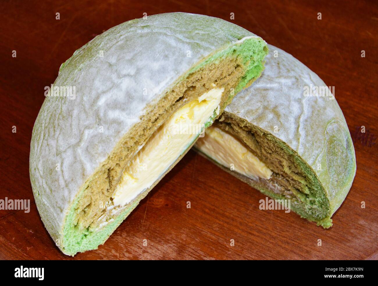 Cut the matcha bread and cross pieces Stock Photo - Alamy