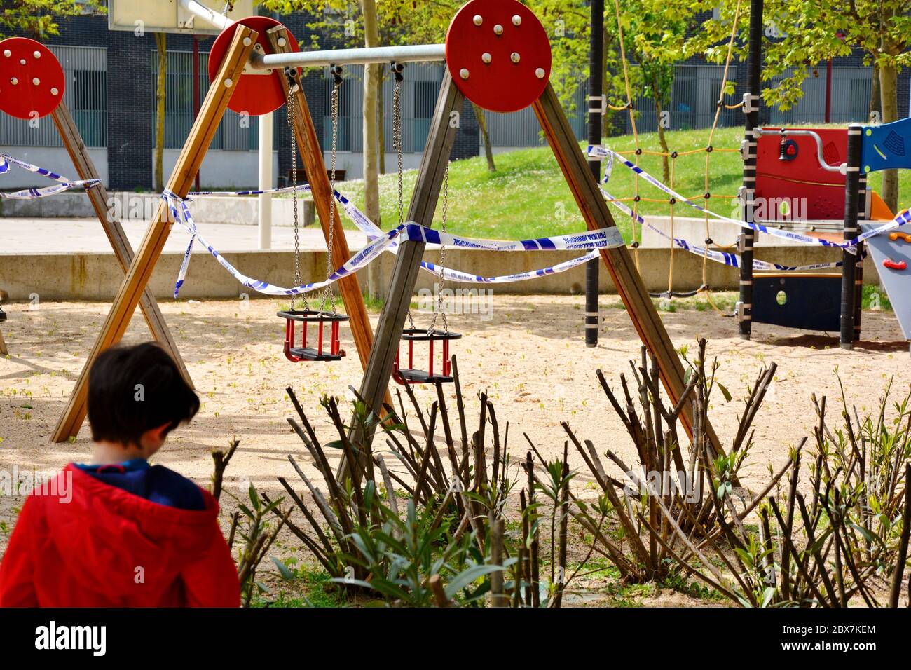 child looking sad a closed playground Stock Photo - Alamy