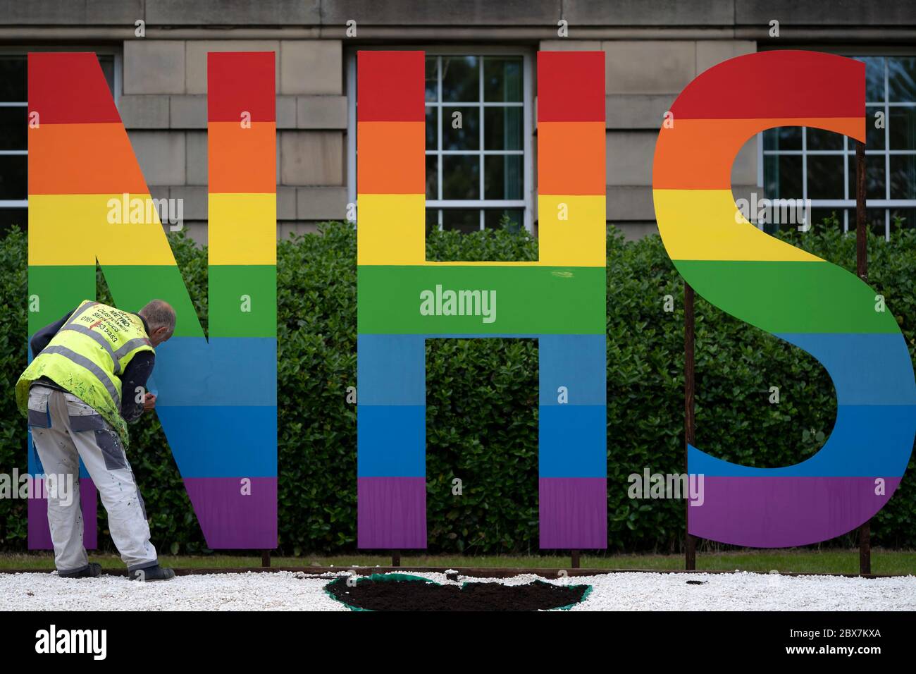 Bury, UK. 5th June, 2020. Picture shows an NHS sign being painted in ...