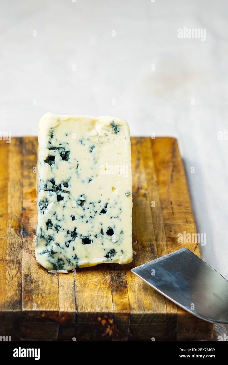 Wedge of blue cheese Stock Photo - Alamy