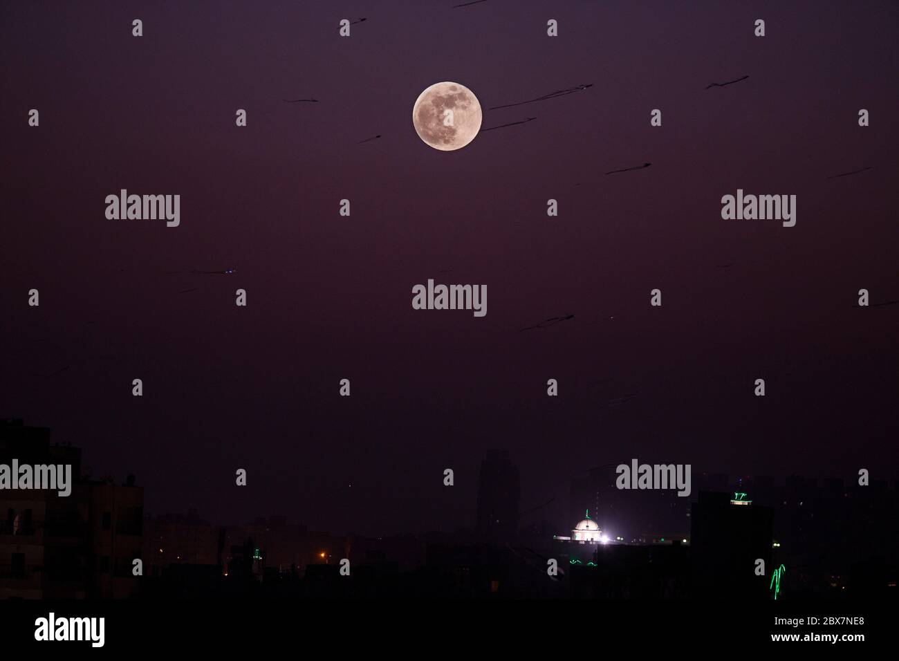 Cairo, Egypt. 5th June, 2020. A full moon is pictured in Cairo, Egypt ...