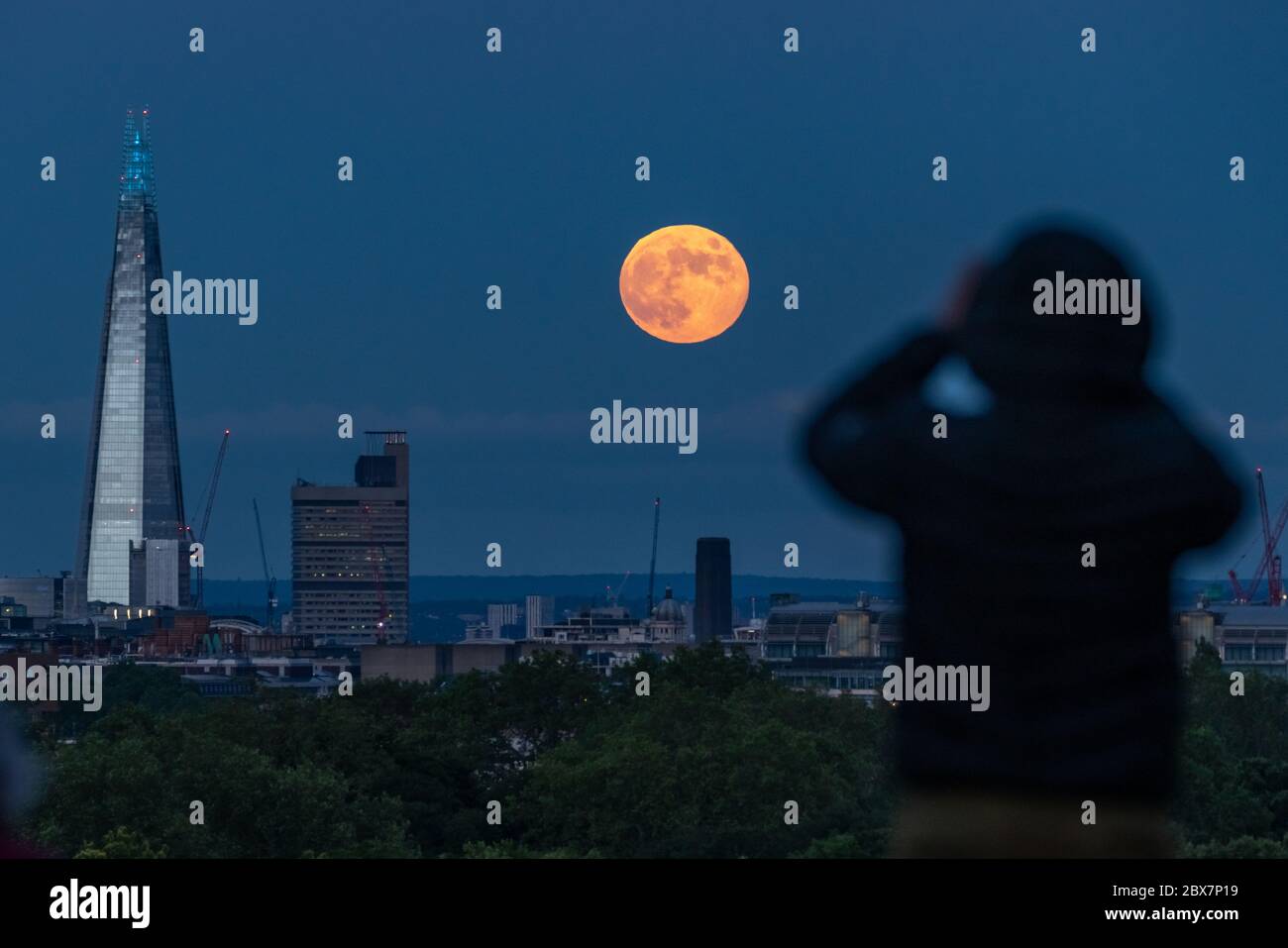 London, UK. 5th June, 2020. UK Weather: Full Strawberry Moon rises over ...