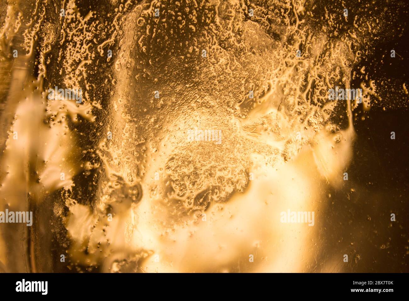 Photo of a closeup fire and ice texture background Stock Photo - Alamy