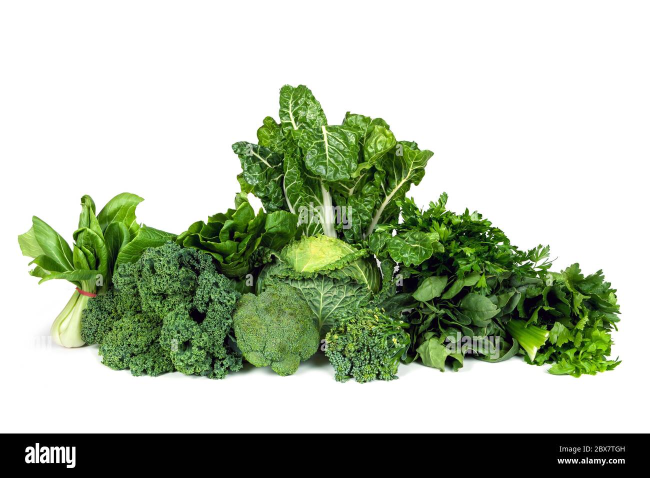 Variety of leafy green vegetables isolated on white background Stock ...